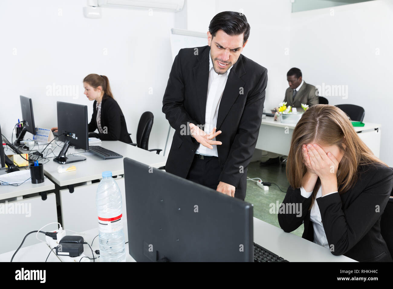 Outraged Hispanic businessman emotionally expressing dissatisfaction ...