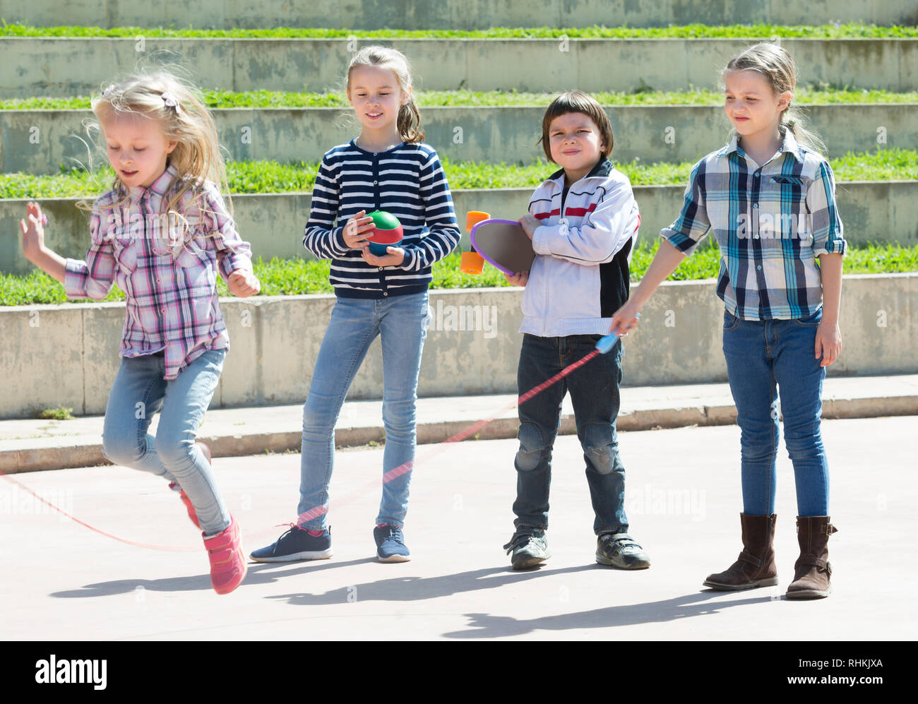 Portrait laughing little girl hanging hi-res stock photography and ...