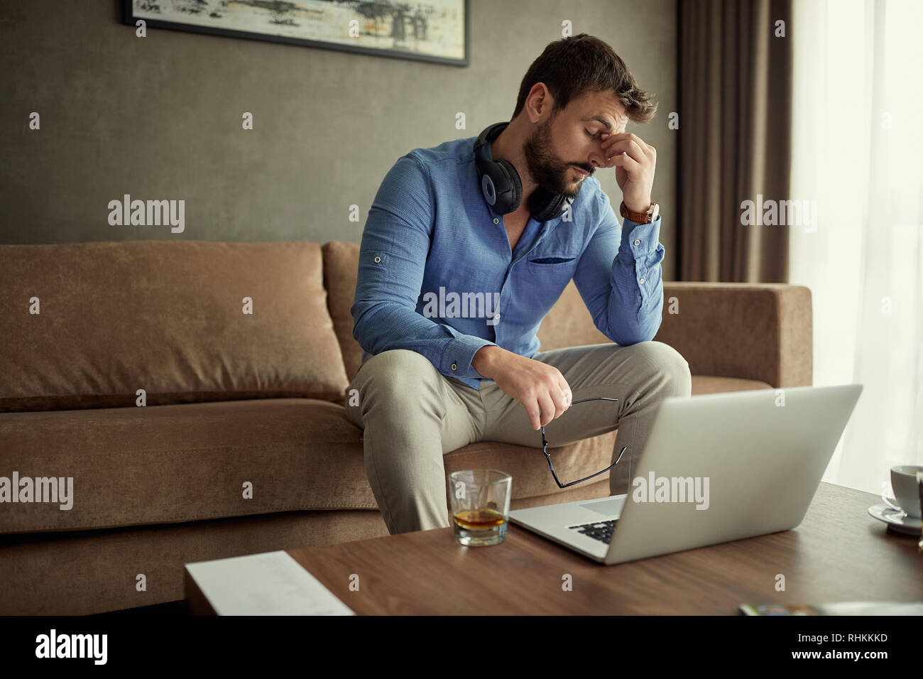 Young man works home computer hi-res stock photography and images - Alamy