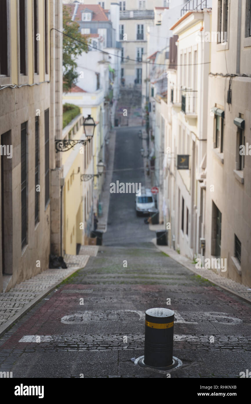 Long and narrow street in chiado Lisbon, Portugal. Elevation, ramp ...