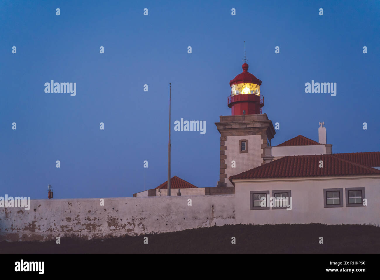 Cape Roca lighthouse (Cabo da Roca). Blue night sky and atlantic ocean ...