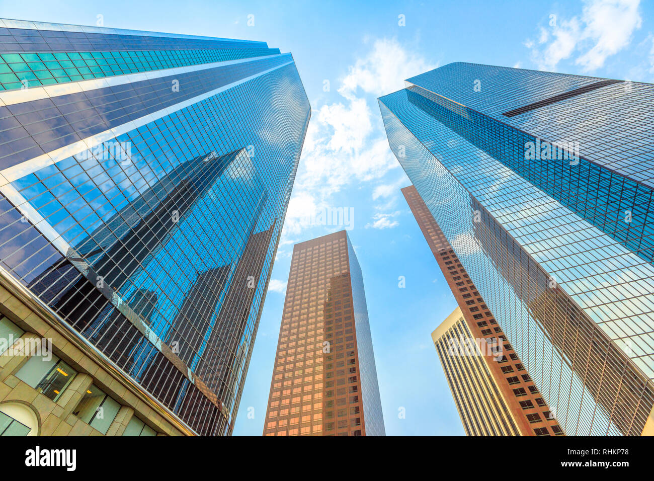 Architecture background. Sky blue glass high-rise reflective facade ...
