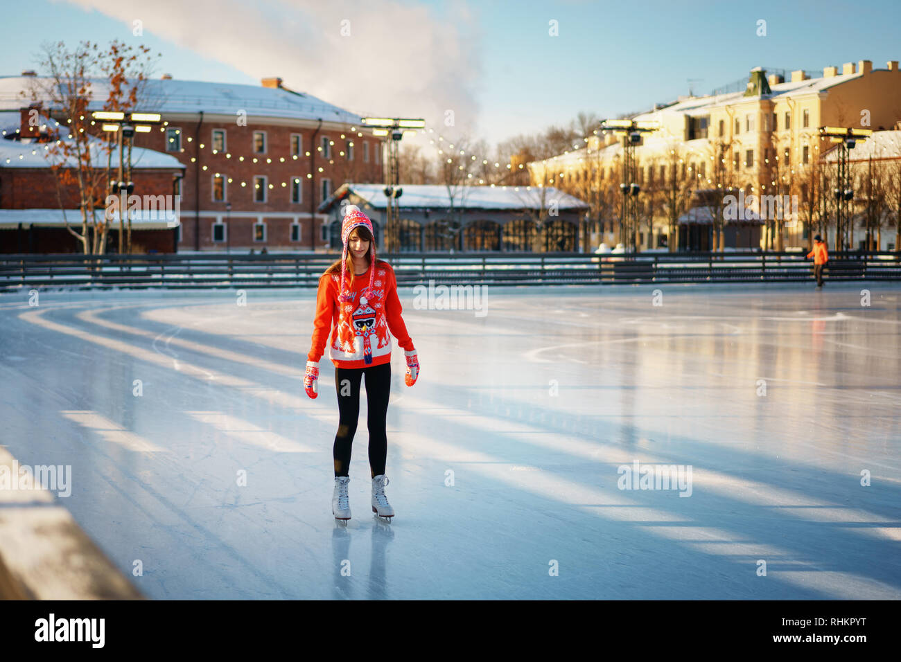 young pretty woman ice skating winter people, the concept of ...