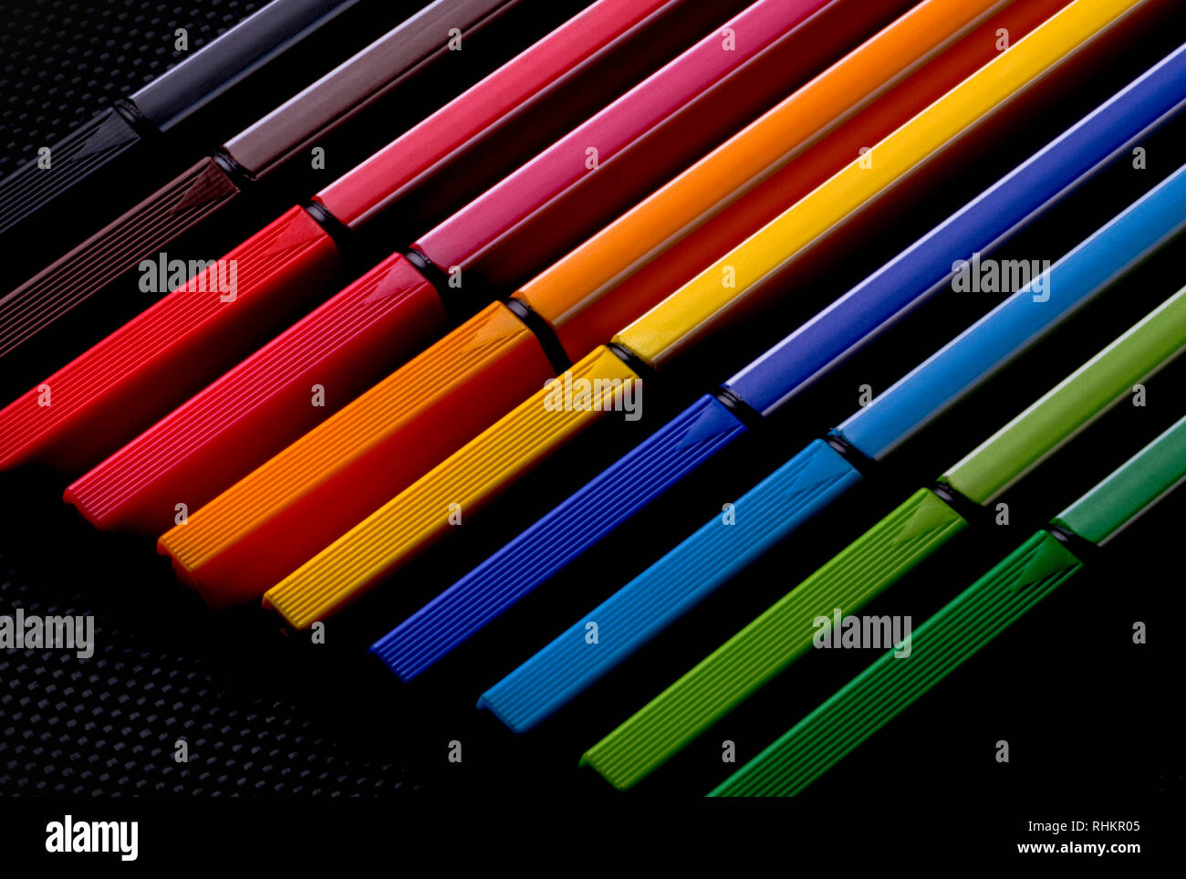 Rainbow spectrum of coloured soft tip drawing pens Stock Photo - Alamy