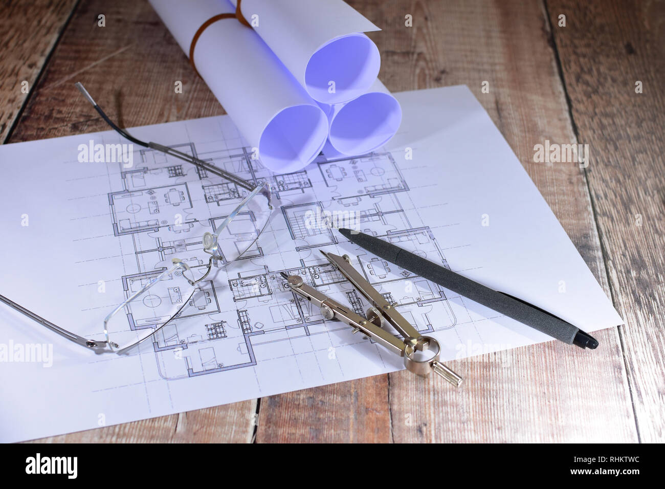 Rolled architectural blueprints construction plans hi-res stock ...