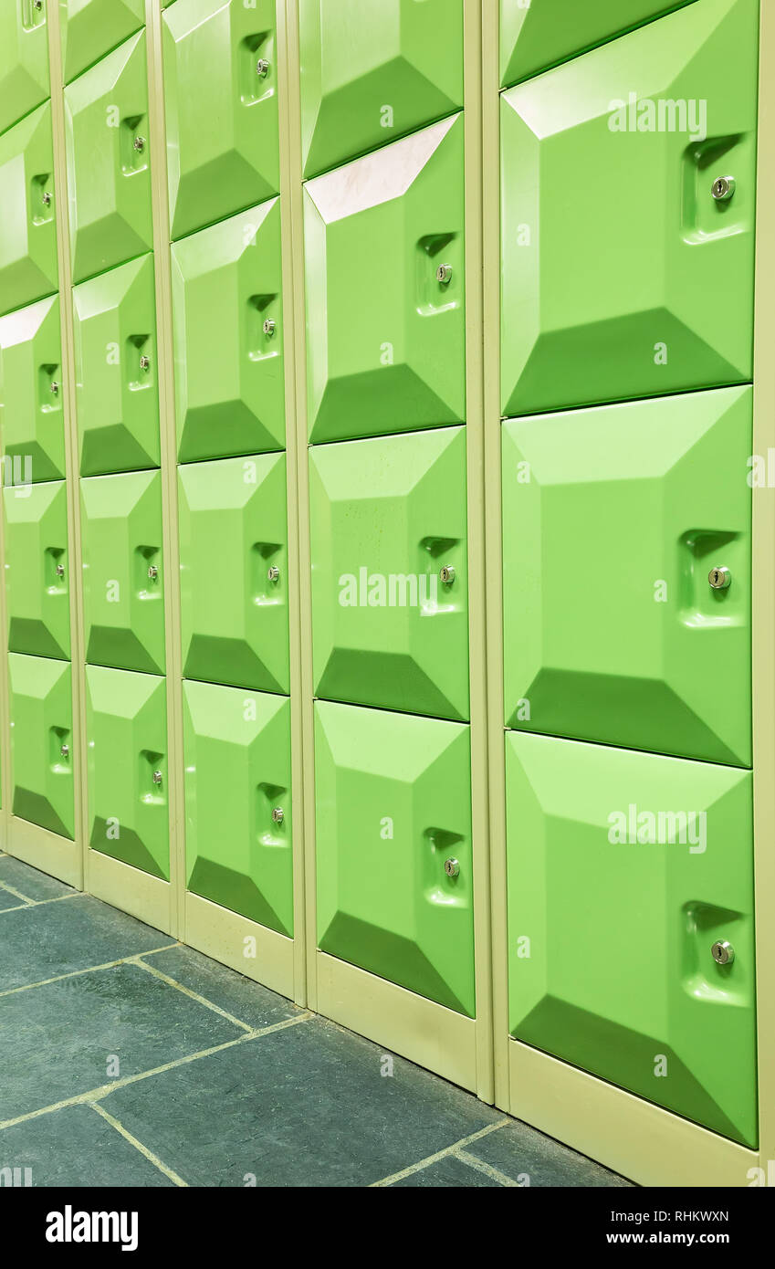 Rows of green student lockers in hall of high school Stock Photo - Alamy