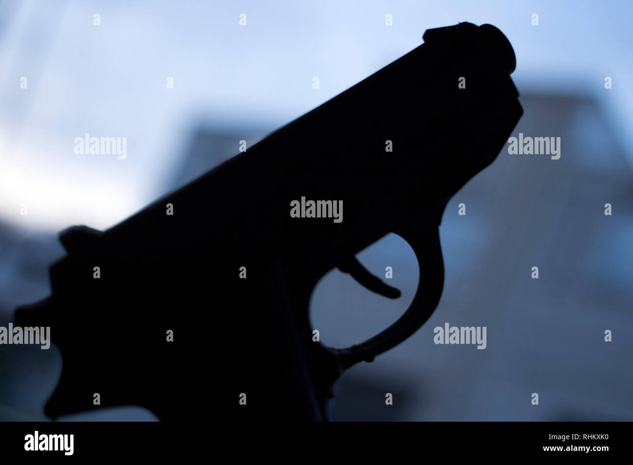 Automatic pistol handgun in artistic light effect moody atmospheric ...