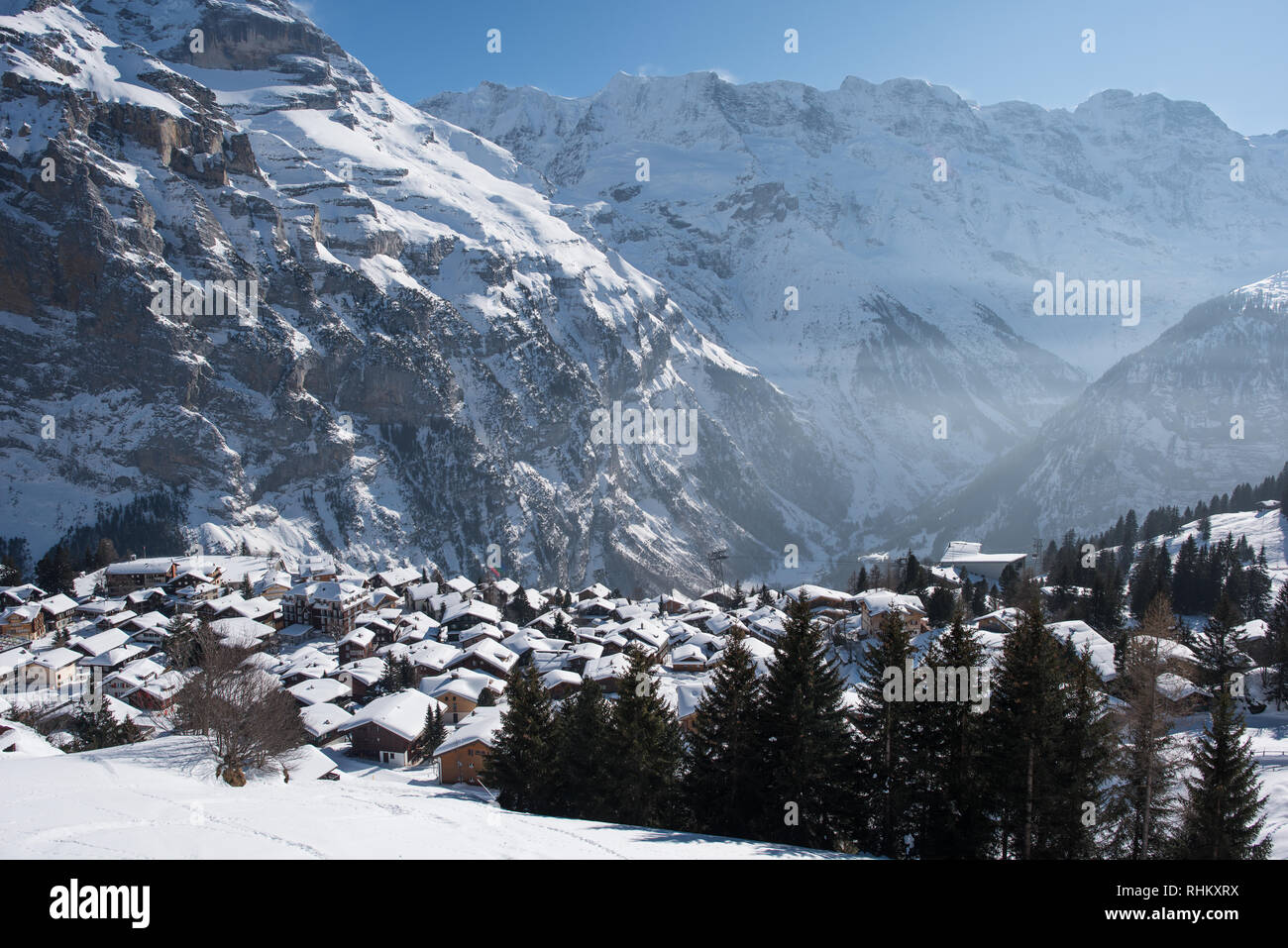 Winter wonderland on a beautiful sunny day in the swiss alps, above the ...