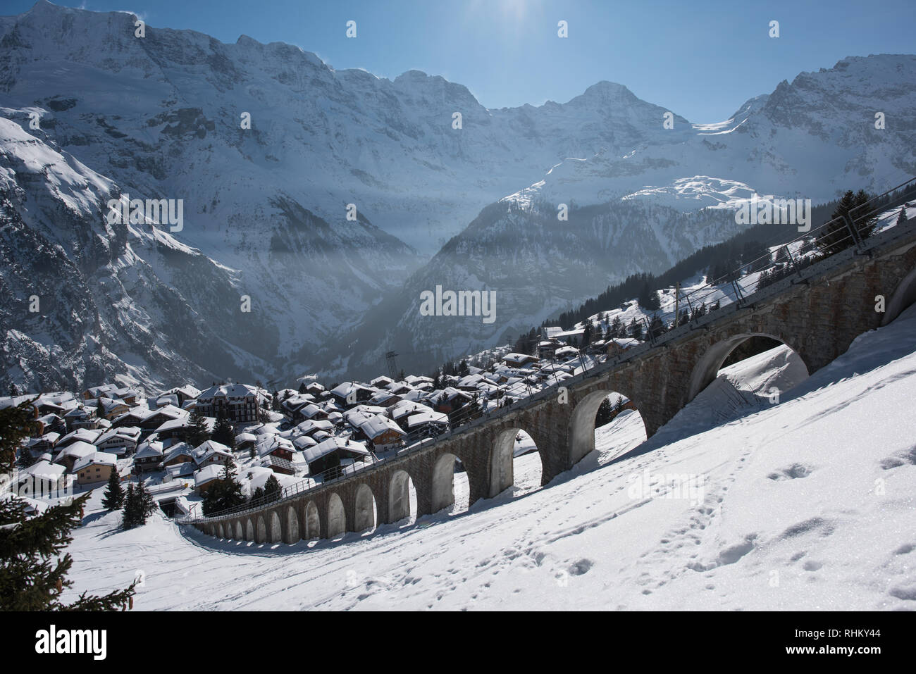 Winter wonderland on a beautiful sunny day in the swiss alps, above the ...