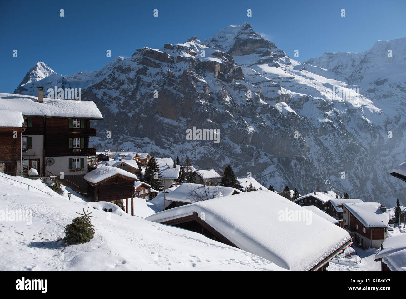 Winter wonderland on a beautiful sunny day in the swiss alps, above the ...