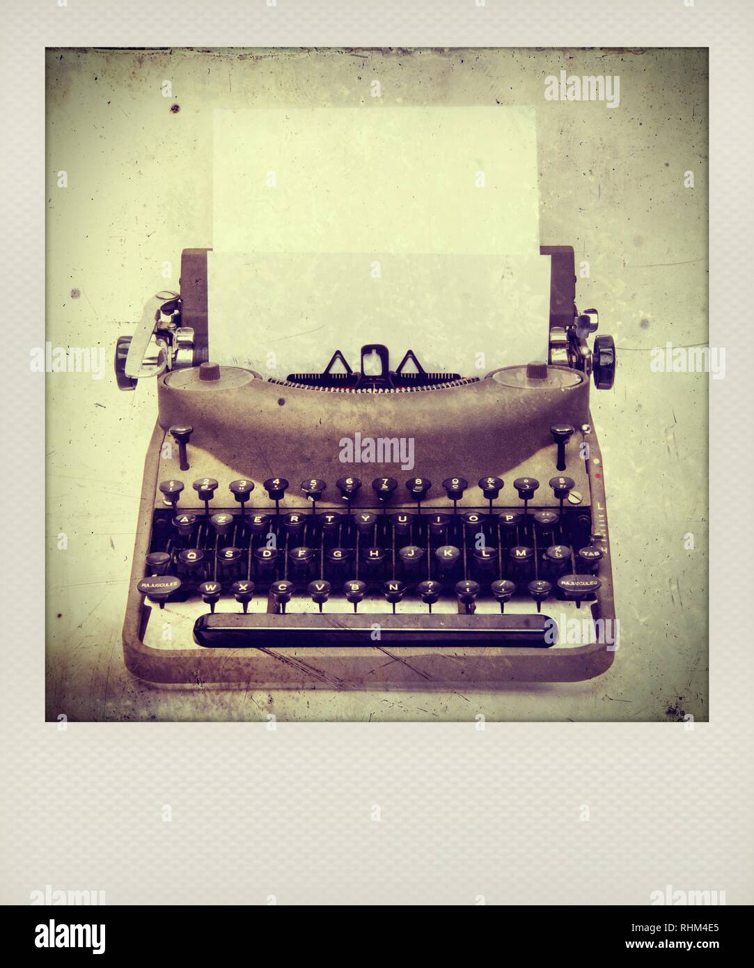 Polaroid photograph of a typewriter Stock Photo - Alamy