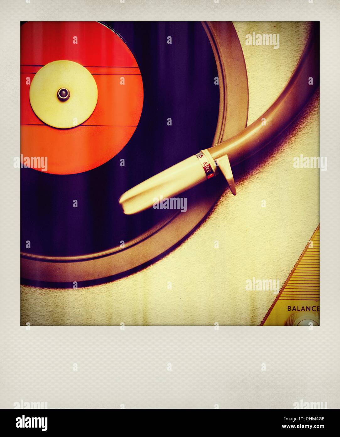 Polaroid photograph of a record player Stock Photo - Alamy