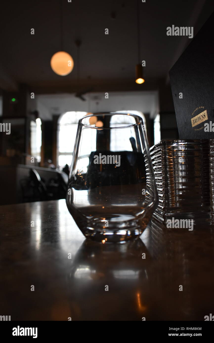 Glass against windows in a bar Stock Photo - Alamy
