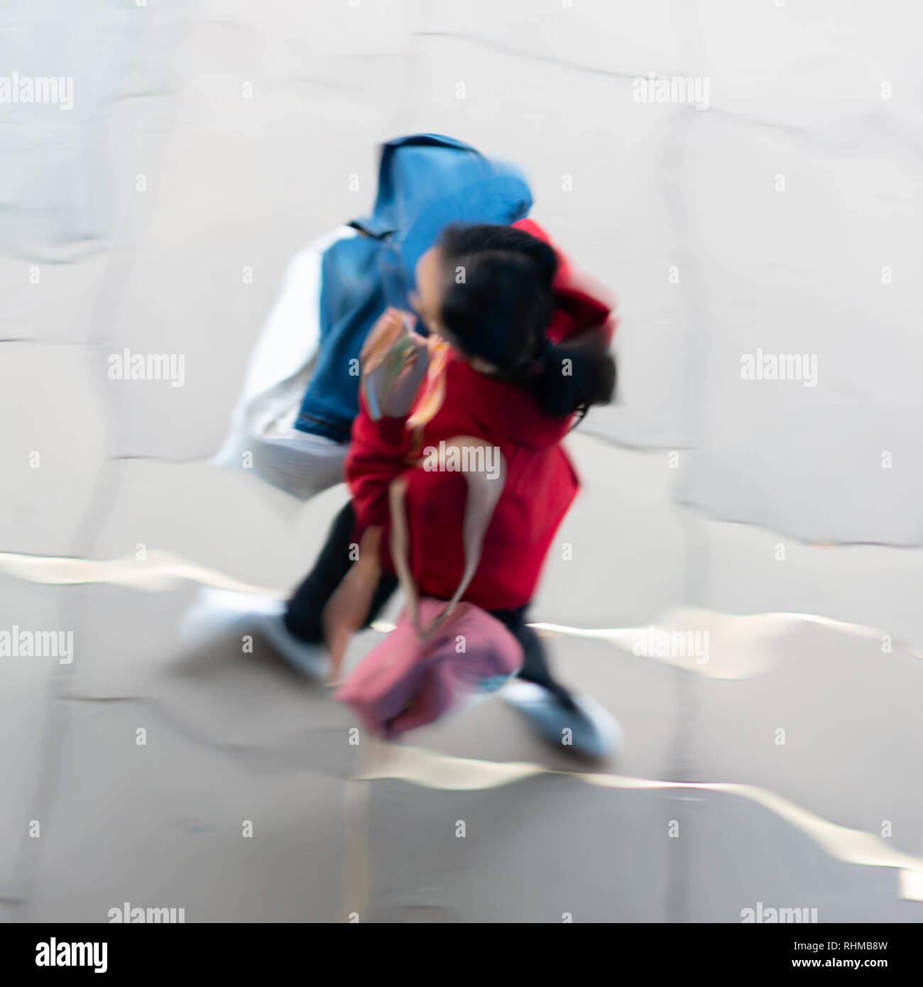 Distorted figures of passers by Stock Photo - Alamy