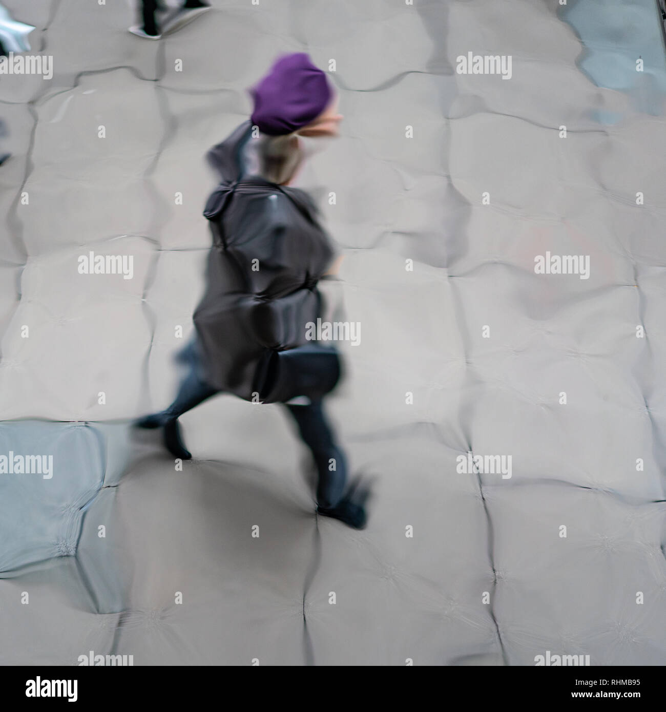 Distorted figures of passers by Stock Photo - Alamy