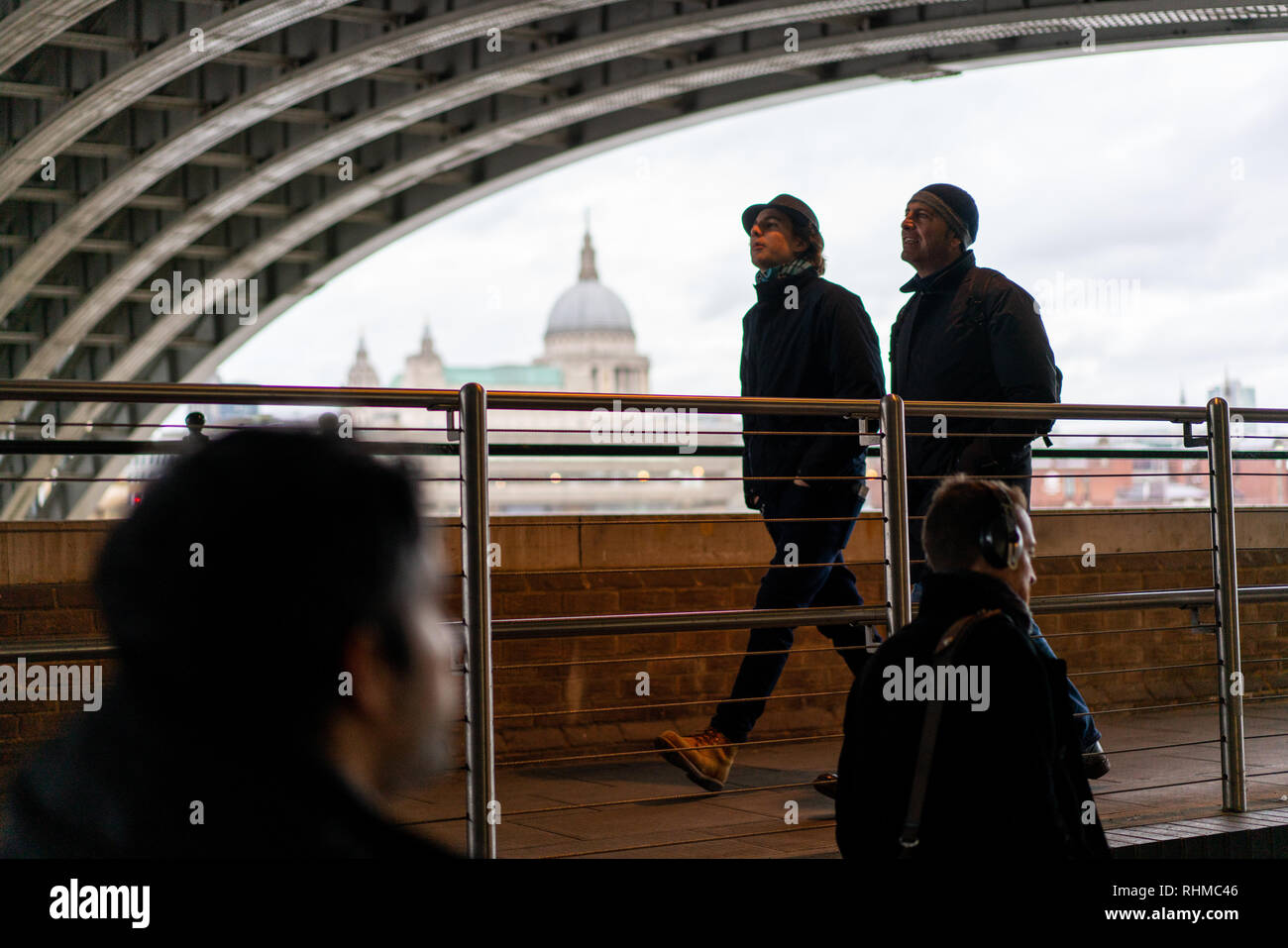 People walking under bridge hi-res stock photography and images - Alamy