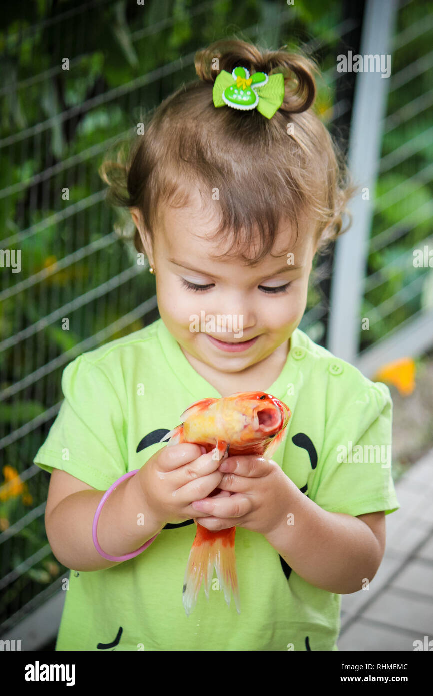 Showing baby how to fish hi-res stock photography and images - Alamy