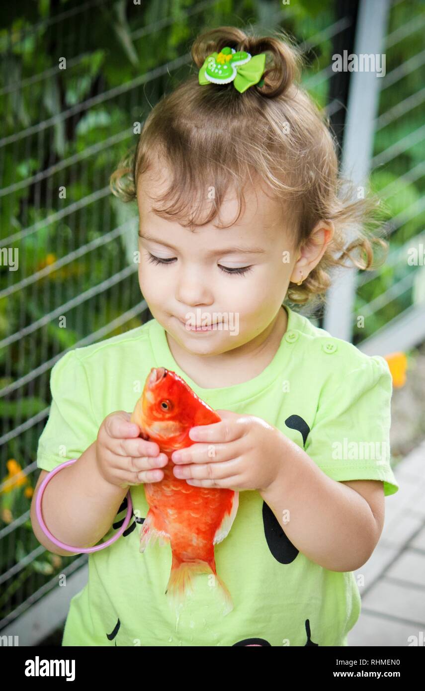 Showing baby how to fish hi-res stock photography and images - Alamy