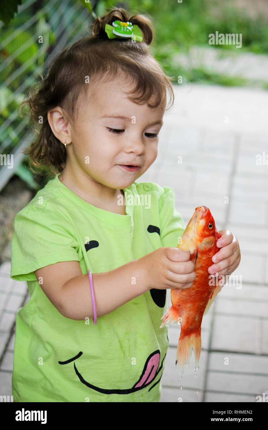 Showing baby how to fish hi-res stock photography and images - Alamy