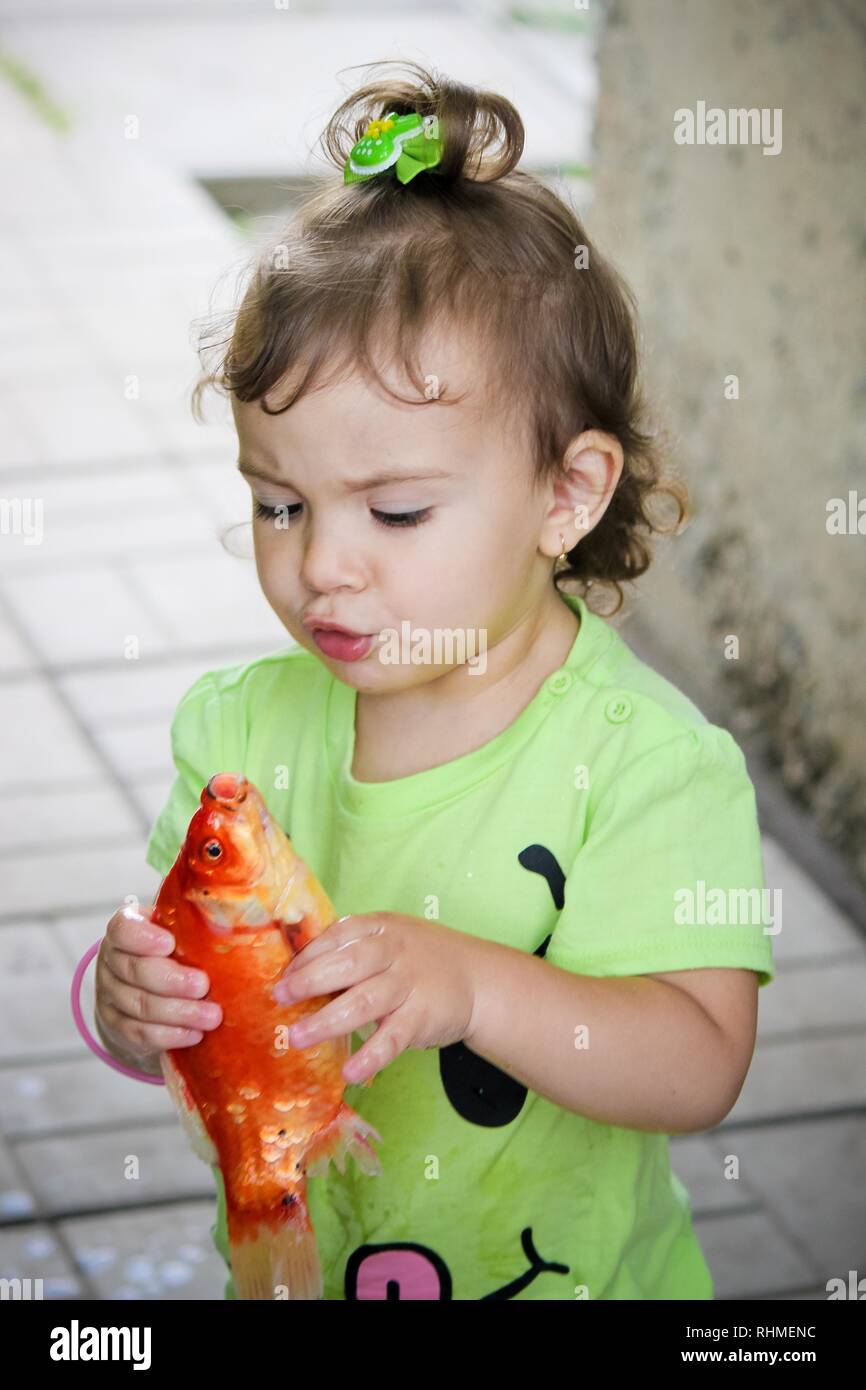 Showing baby how to fish hi-res stock photography and images - Alamy