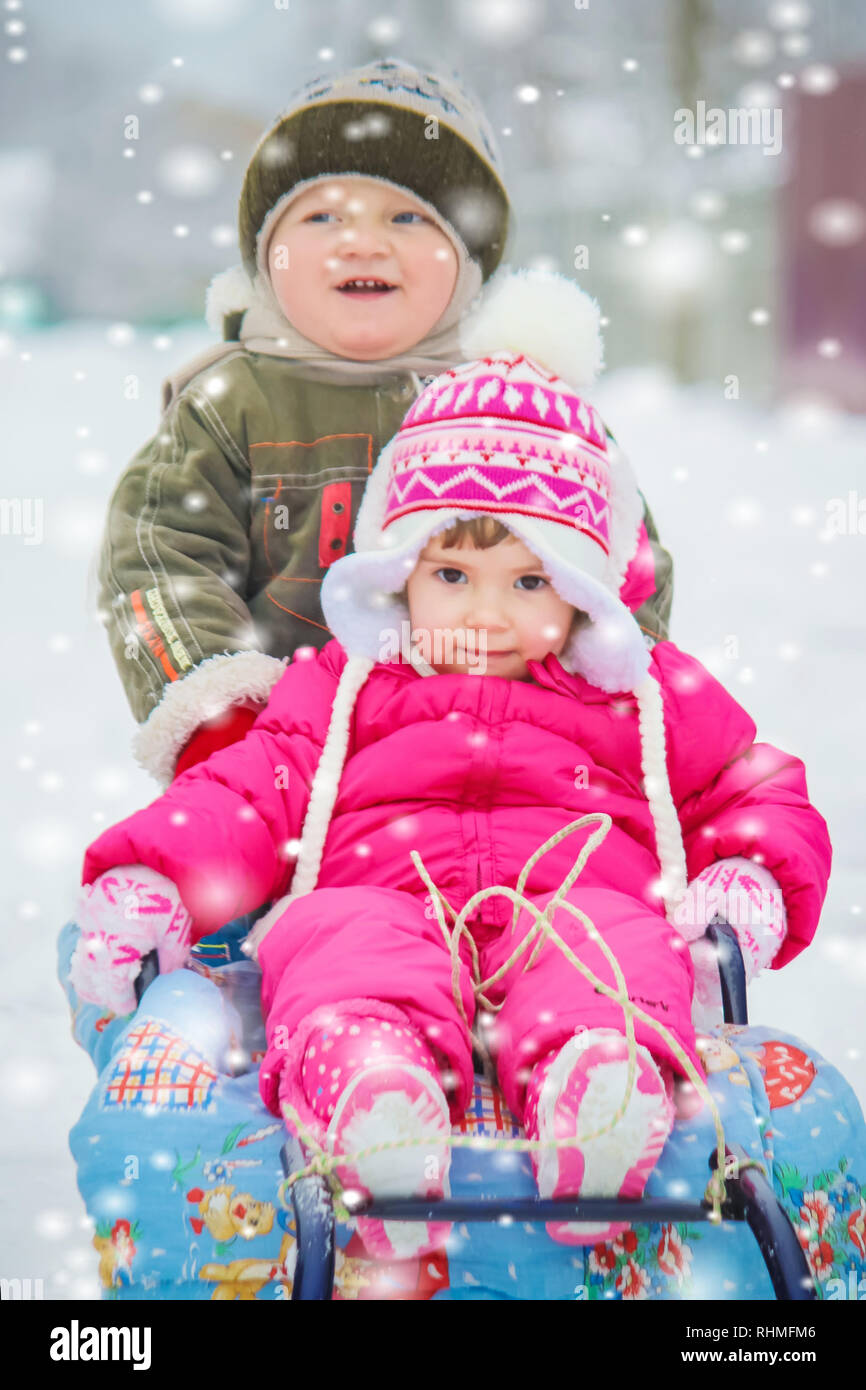 Small child plays in winter hi-res stock photography and images - Alamy
