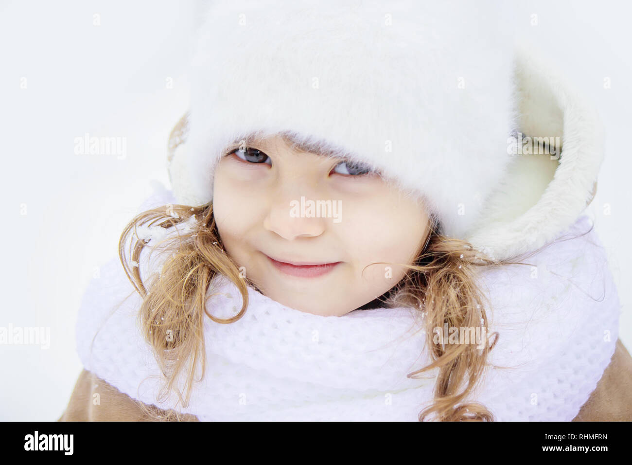 Small child plays in winter hi-res stock photography and images - Alamy