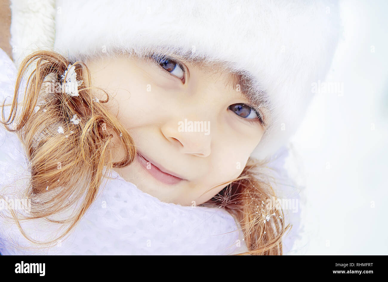 Child plays snow in hi-res stock photography and images - Alamy