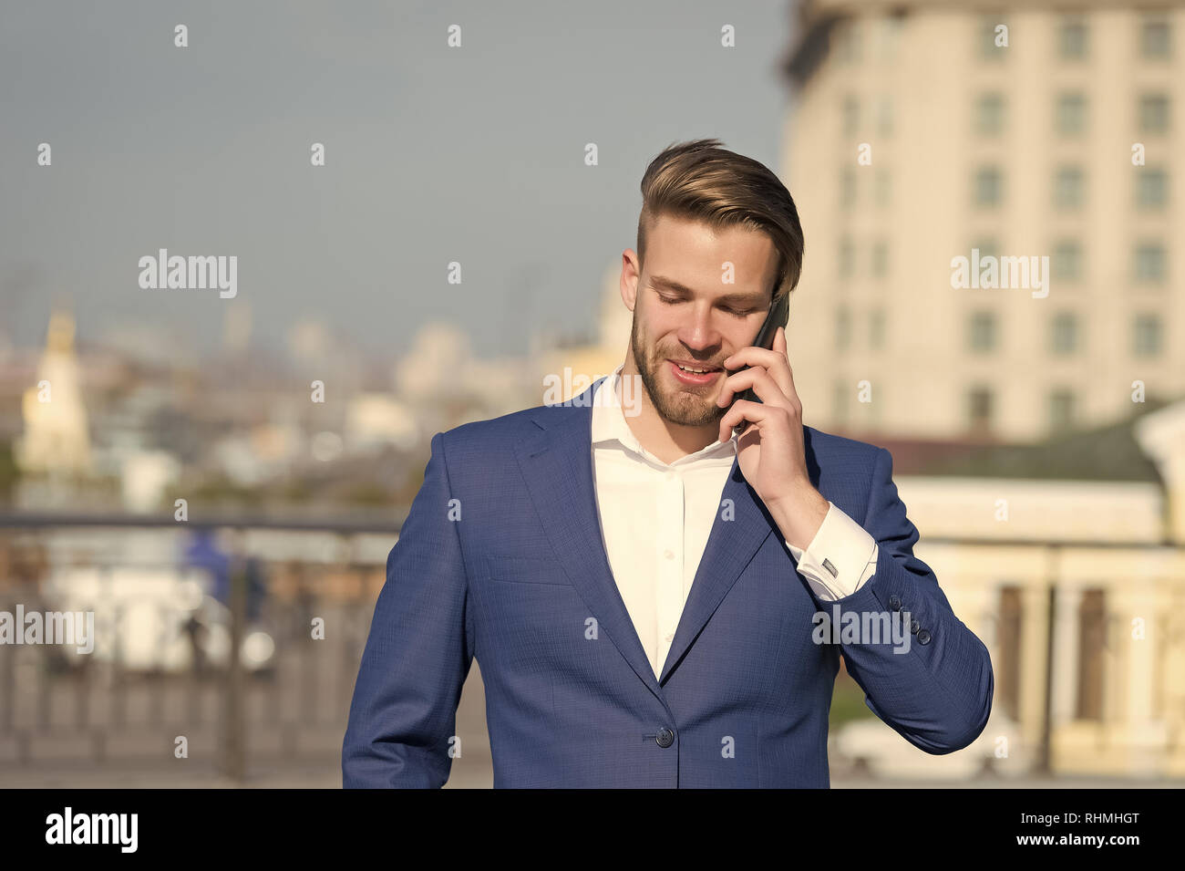 Important business call. Businessman happy smiling use smartphone for ...