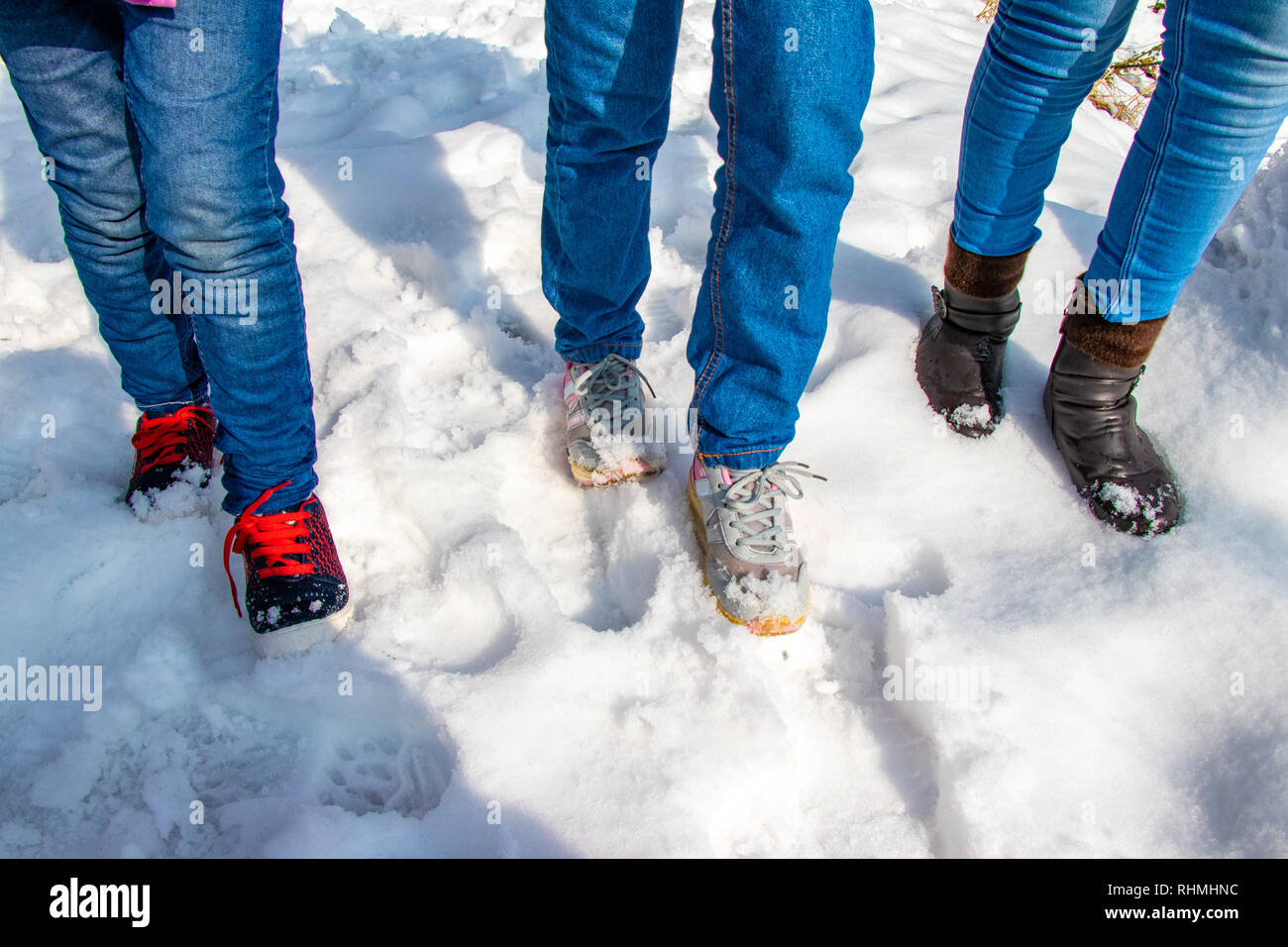 Girls walking in the snow, footprint in snow Stock Photo - Alamy