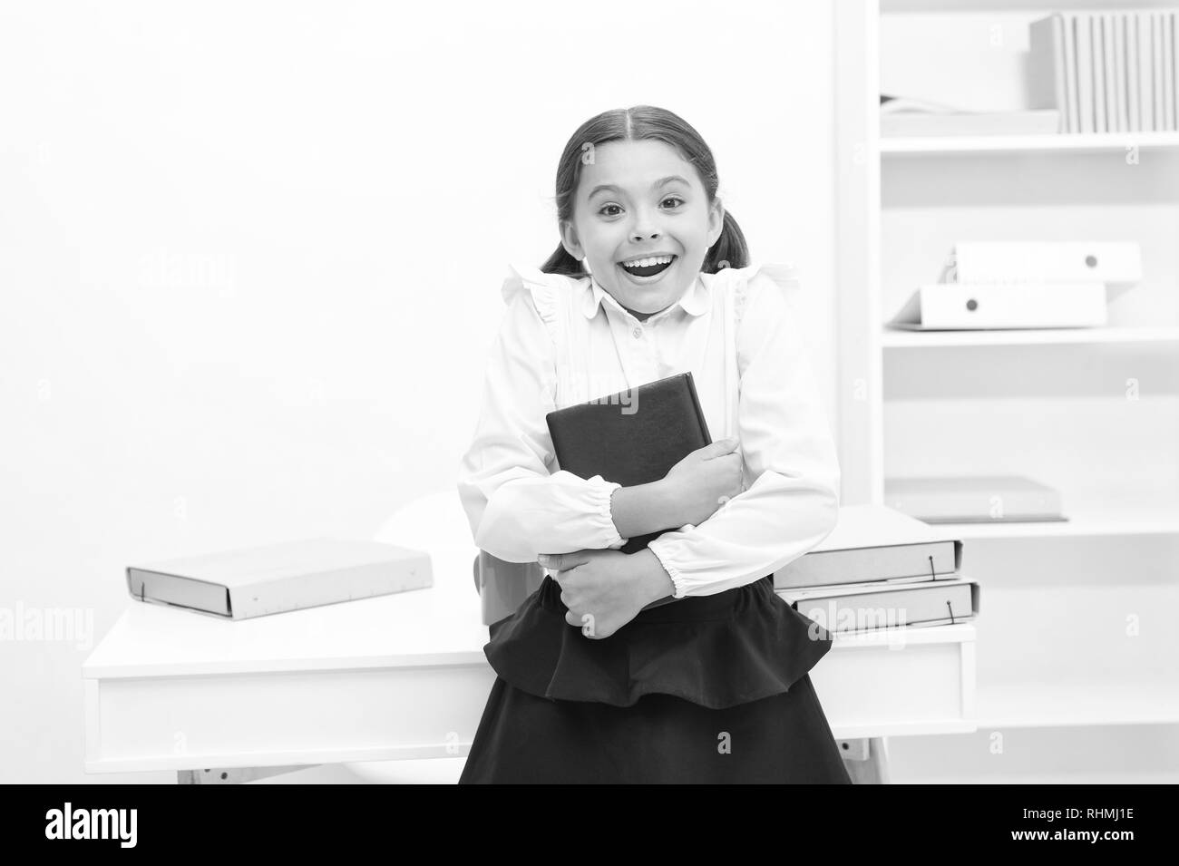 Information concept. Happy child got information from reading. Child ...