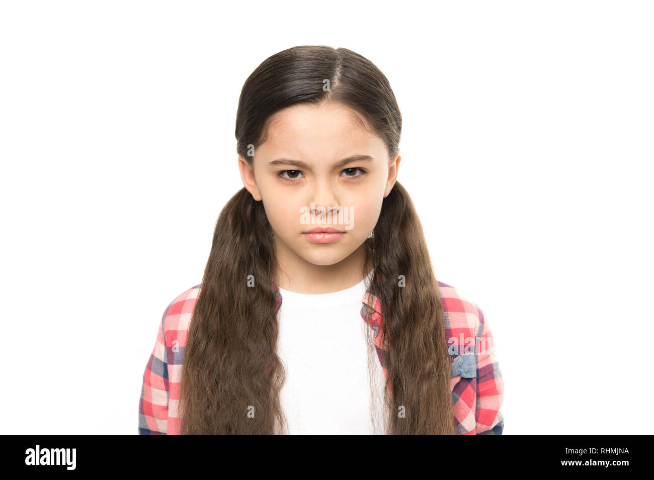 Kid girl suspect you. Brutal revenge. Unhappy child hateful glance ...