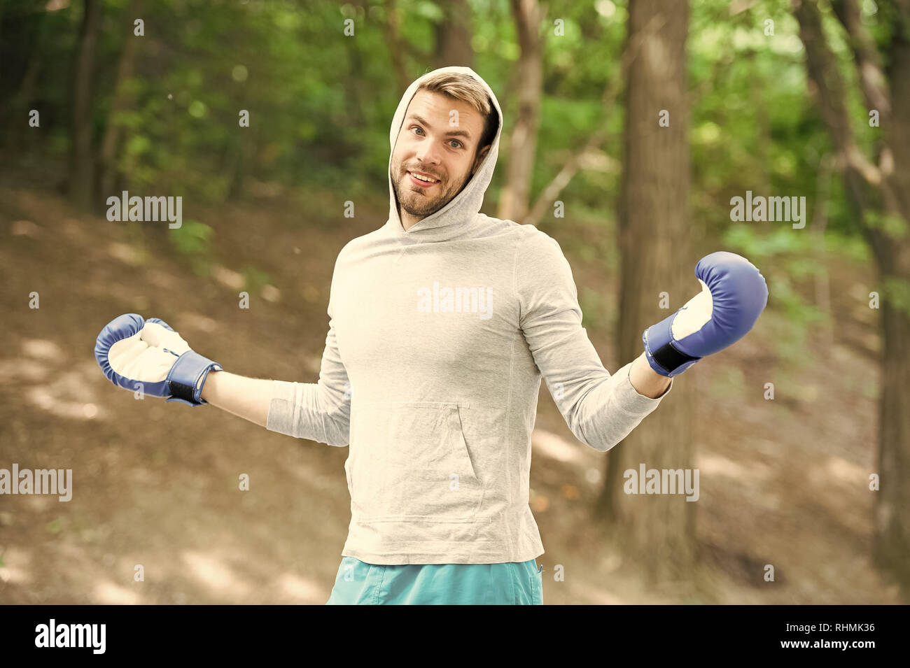 Sportsman boxer training with boxing gloves. Boxing concept. Man ...