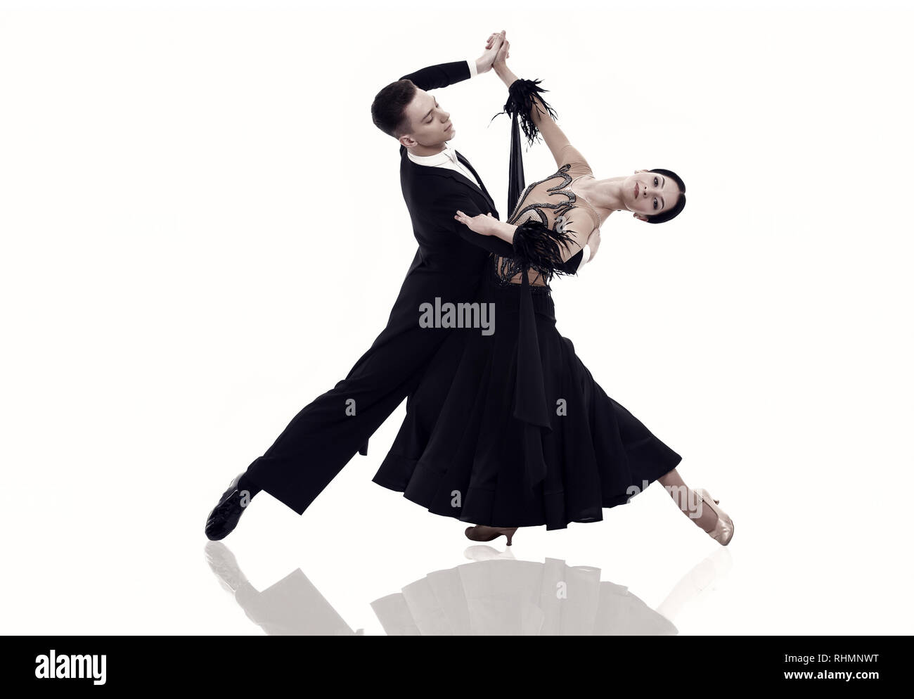 ballroom dance couple in a dance pose isolated on white background ...