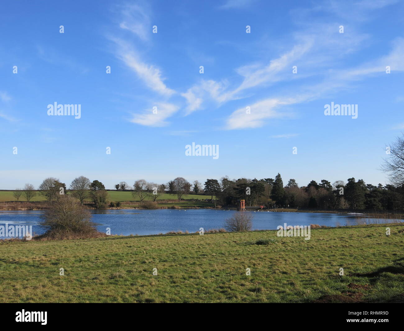 Big blue skies & wispy white clouds above the reservoir at Sywell ...