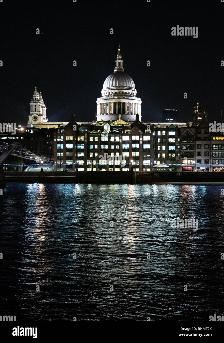 St Pauls Cathedral lit up at night viewed across the River Thames Stock ...
