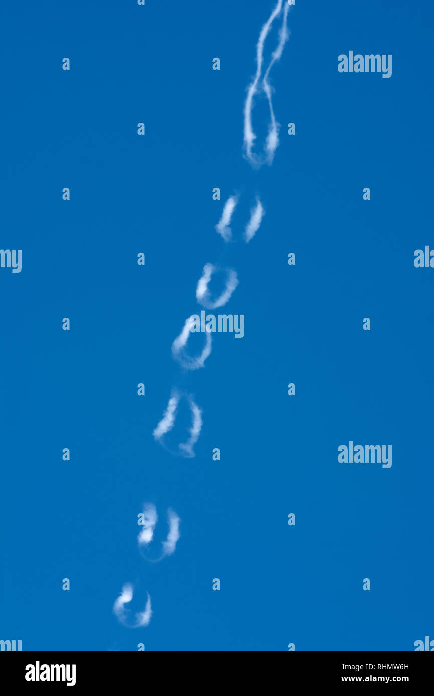 An unusual aircraft contrail Stock Photo - Alamy