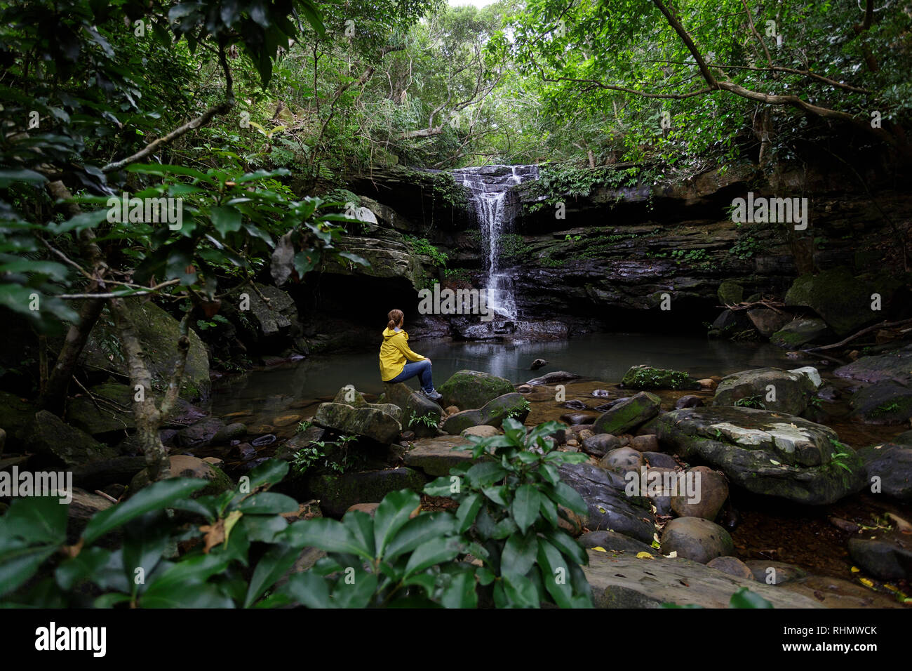 Sitting under waterfall hi-res stock photography and images - Alamy