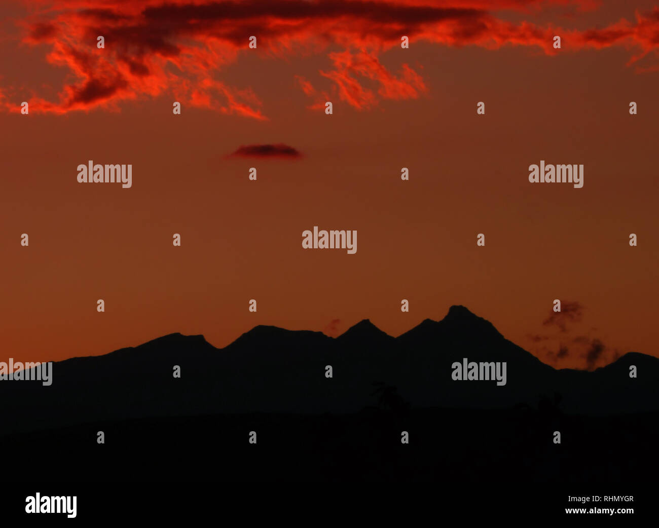Clouds silhouette mountains hi-res stock photography and images - Alamy