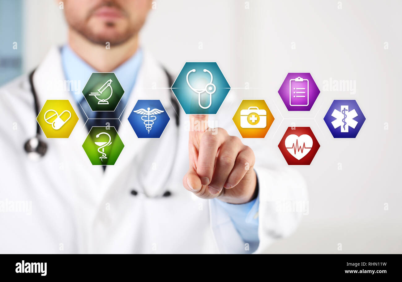 Doctor hand touch screen with medical care symbols and icons colored on ...