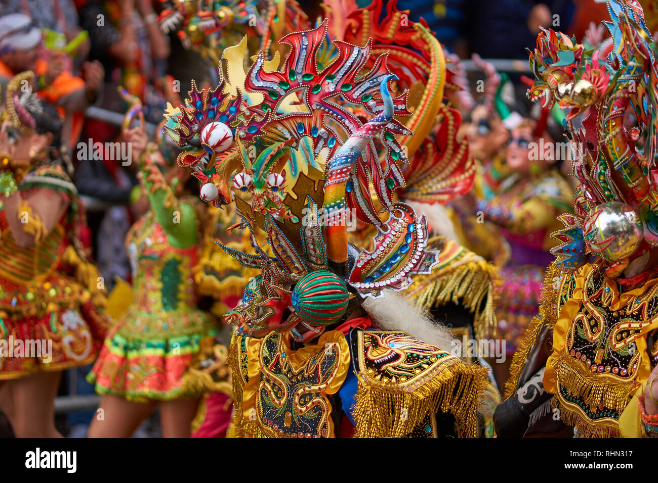Diablada dancers in ornate costumes parade through the mining city of ...