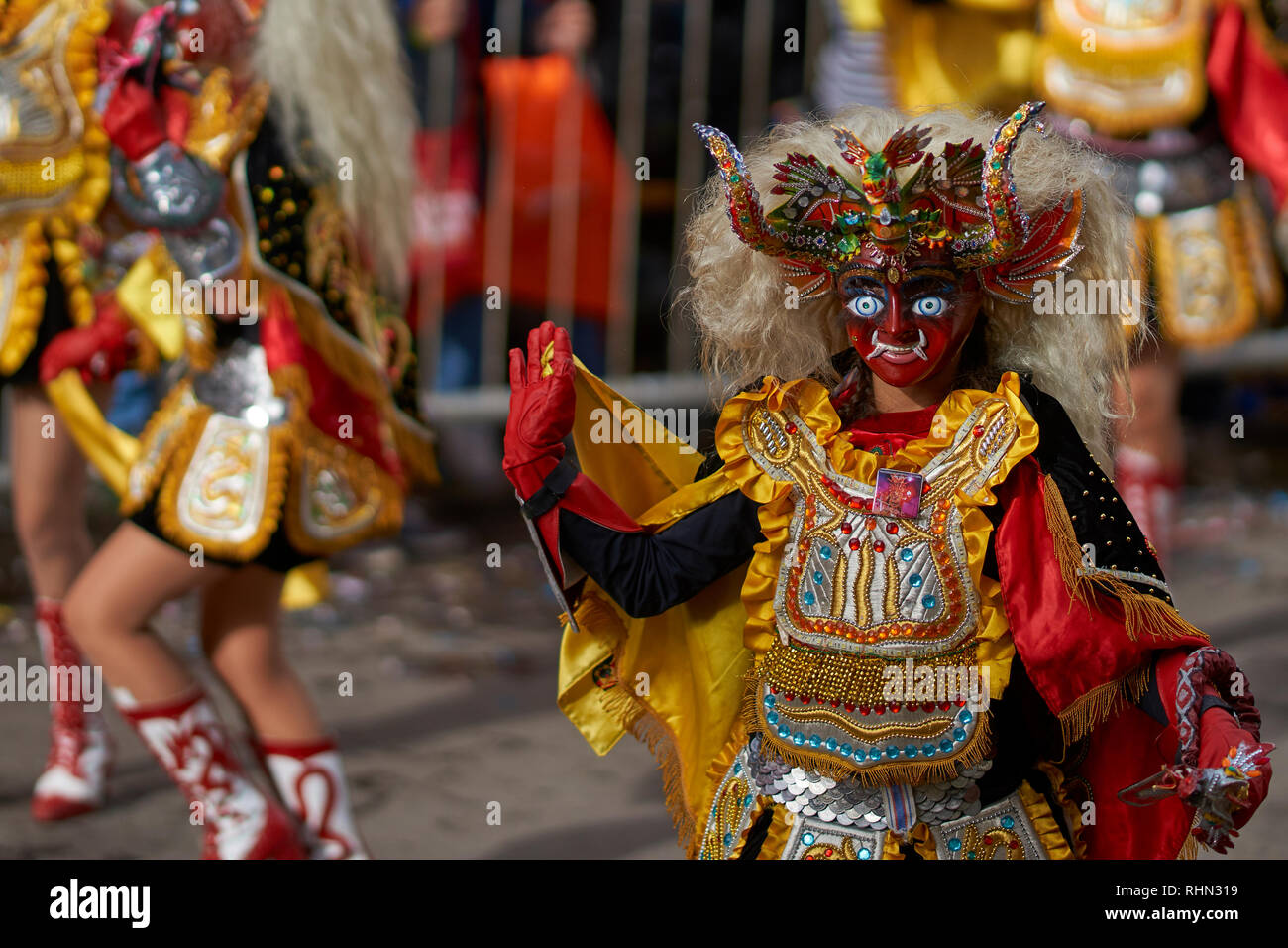 Diablada dancers in ornate costumes parade through the mining city of ...