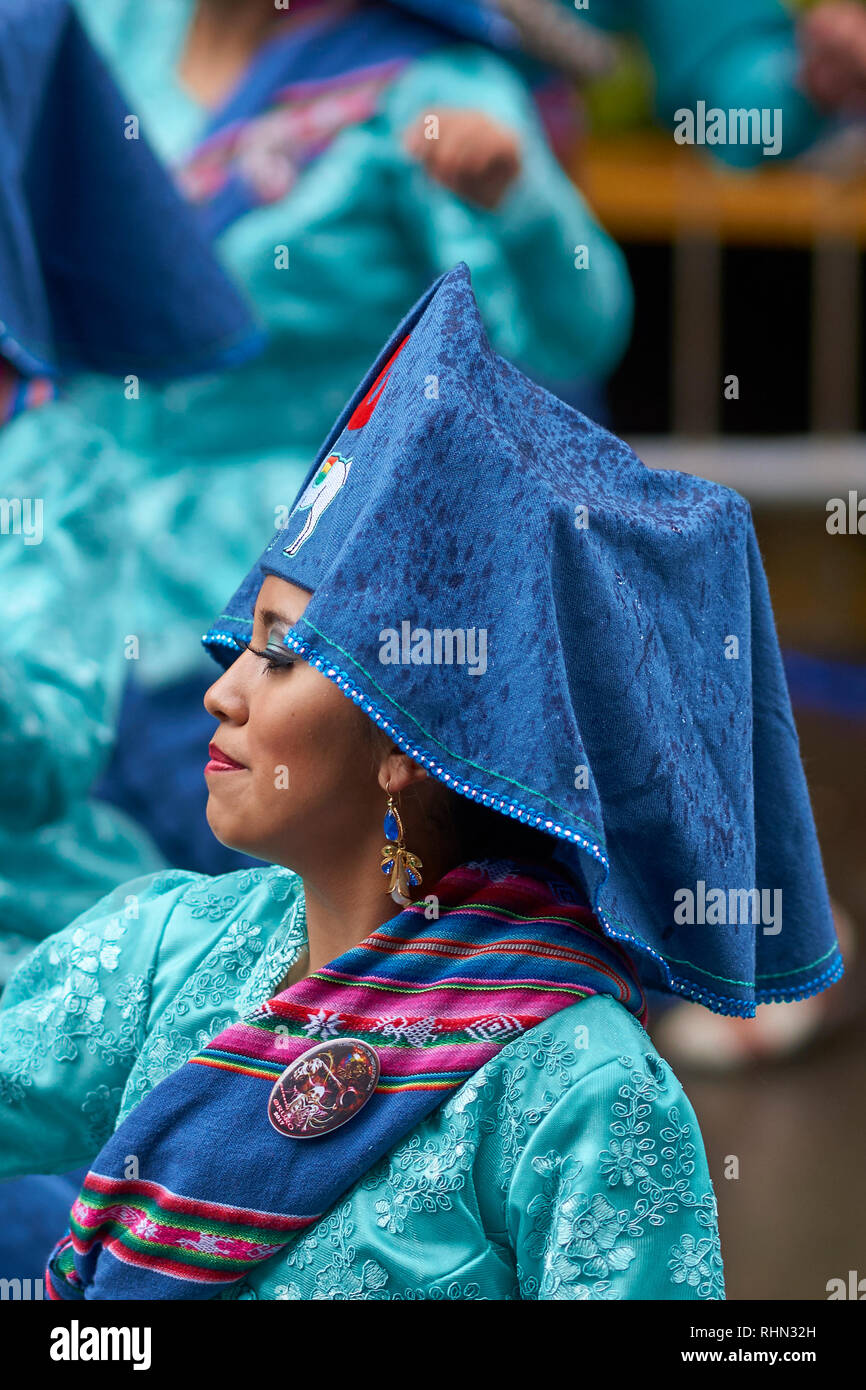 Llamerada dancers in ornate costumes performing as they parade through ...