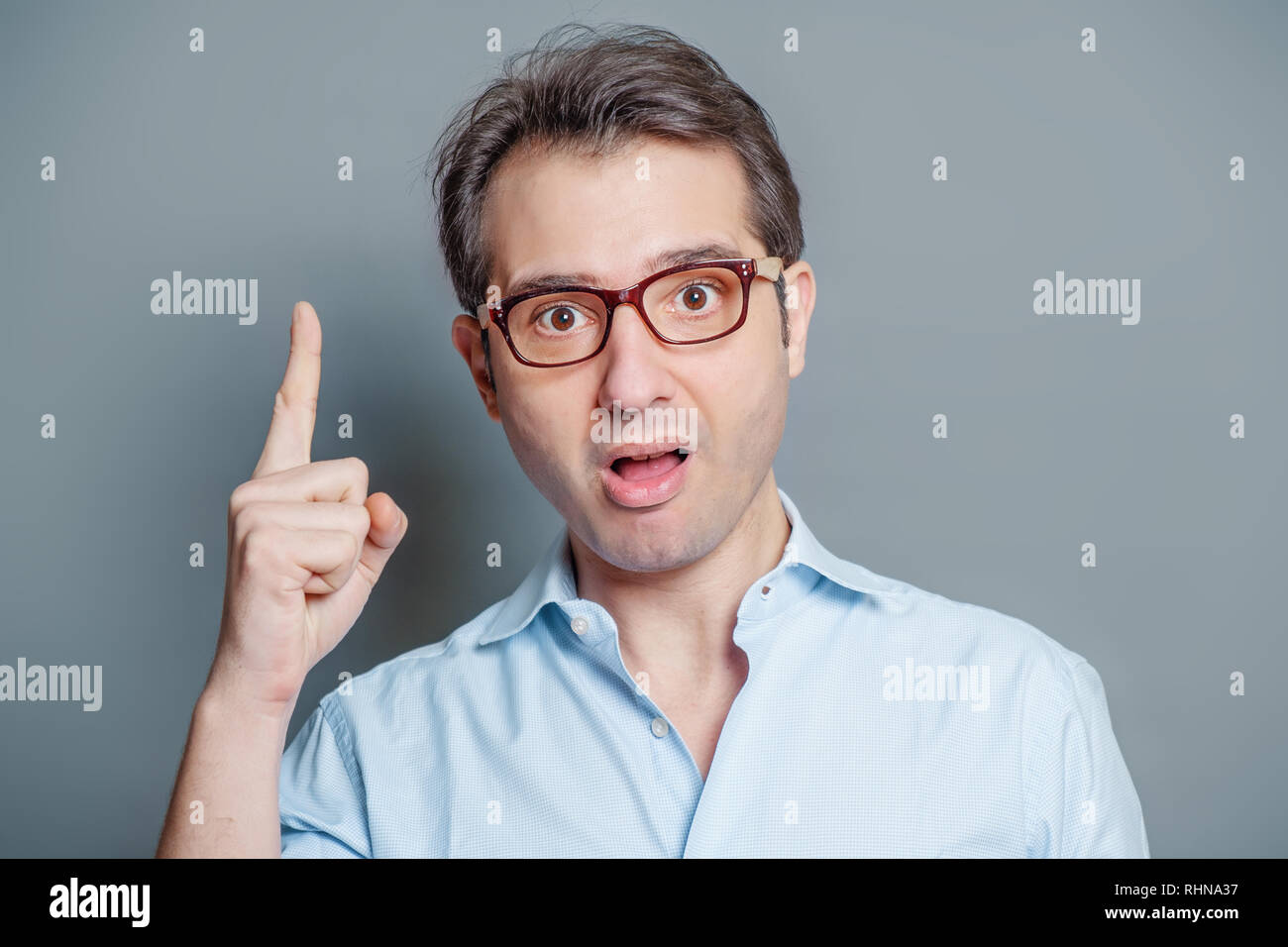 Man pointing finger something on hi-res stock photography and images ...
