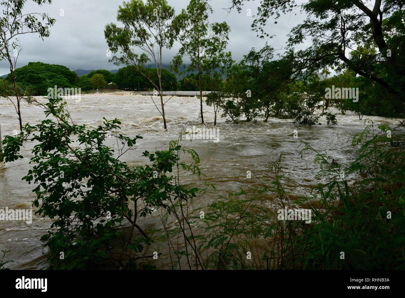 Ross river eroding the banks as flood water rage, Queensland, Australia ...