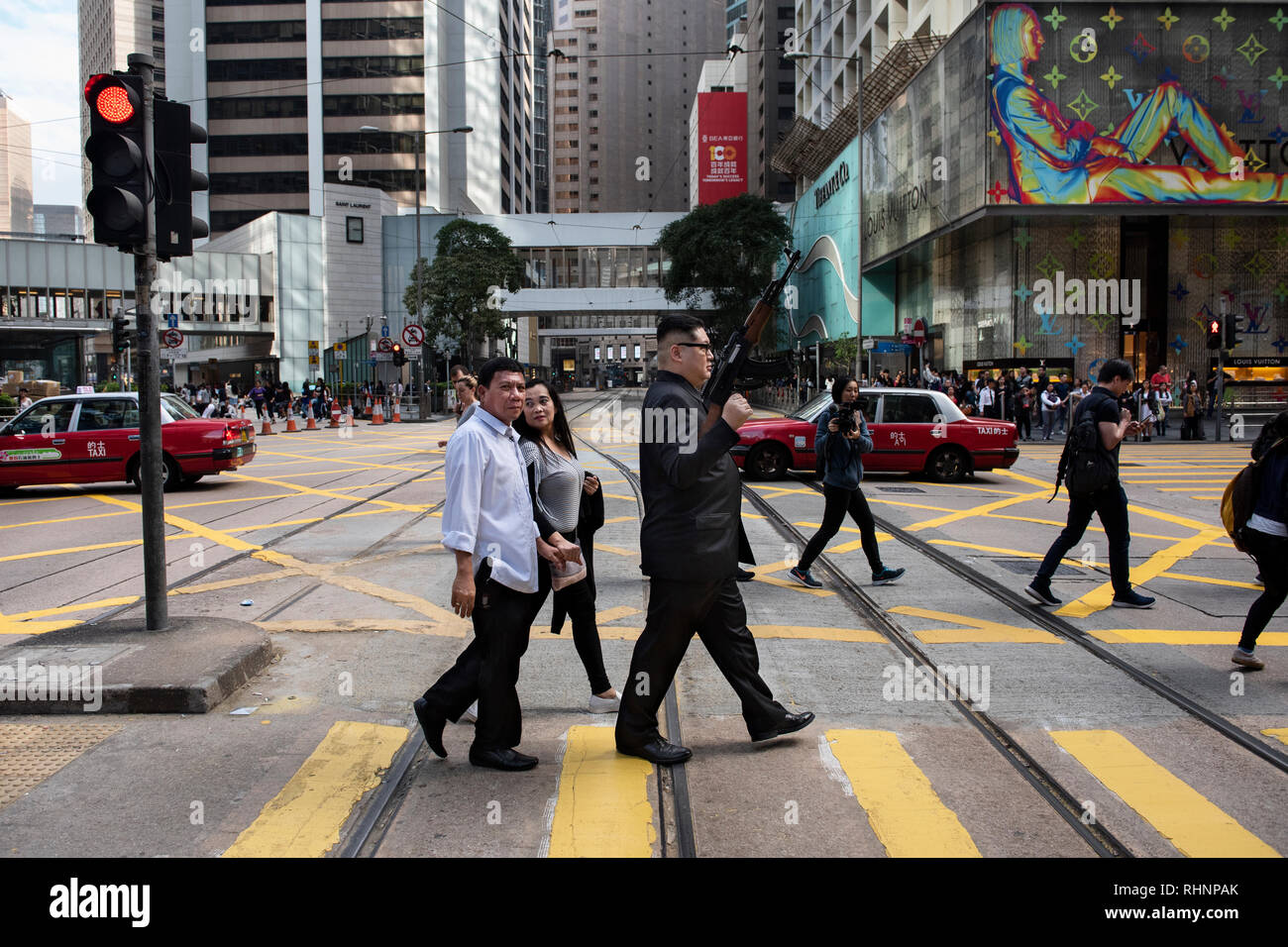 Rodrigo Duterte and Kim Jong-un impersonators seen crossing the street ...