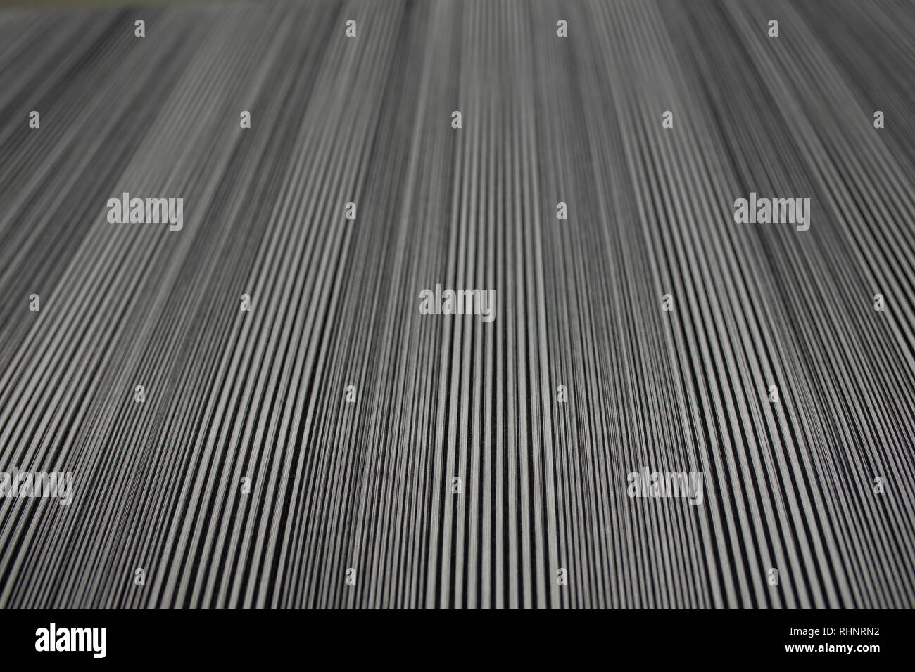 Yarn thread lines on the weaving loom machine. A loom machine for ...