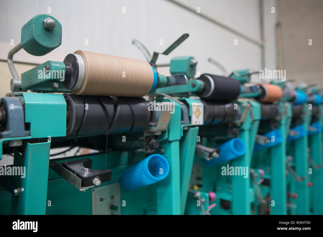 Yarn spools in a textile factory hi-res stock photography and images ...