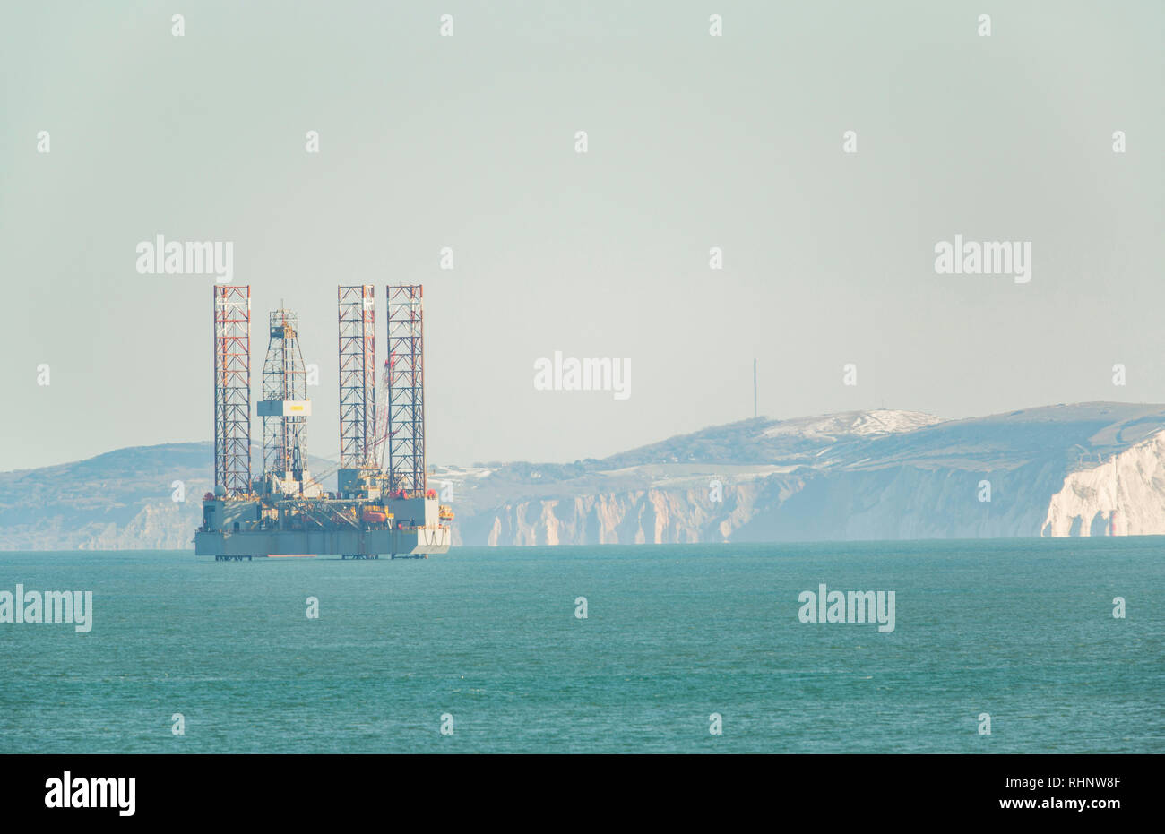 An ENSCO 72 oil rig against a backdrop of the Isle of Wight. The rig ...