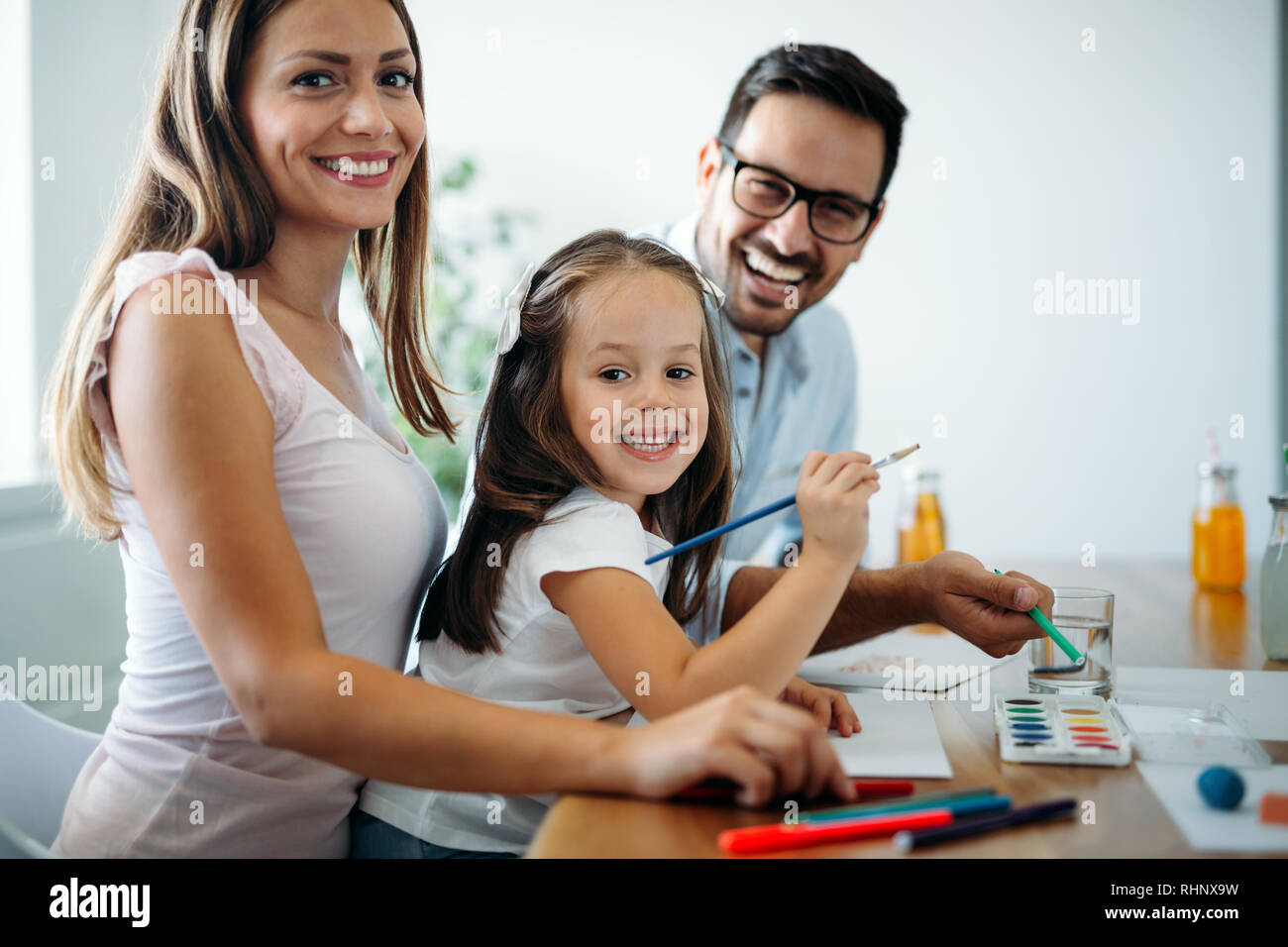 Happy family having fun time at home Stock Photo - Alamy