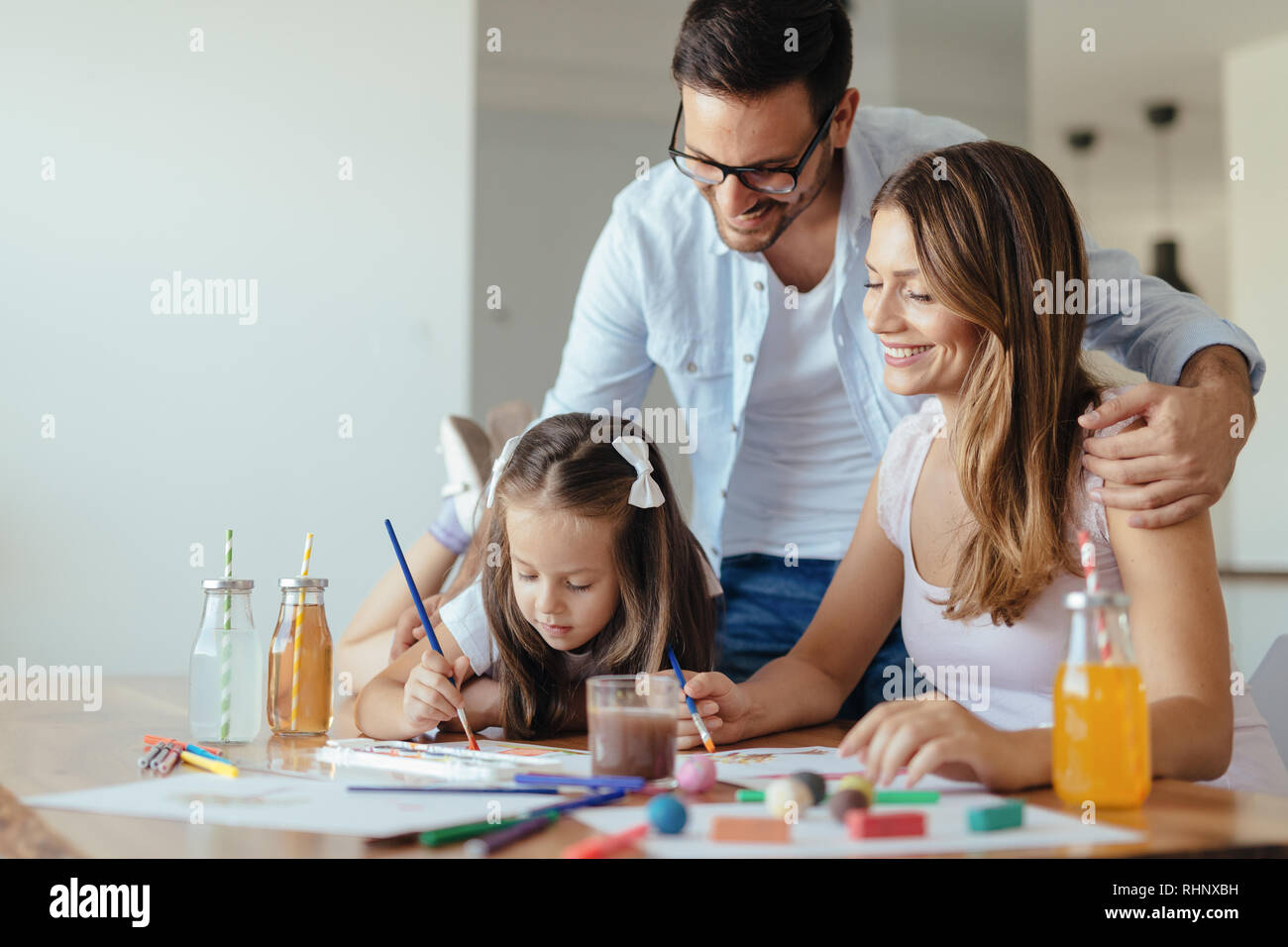 Happy family having fun time at home Stock Photo - Alamy